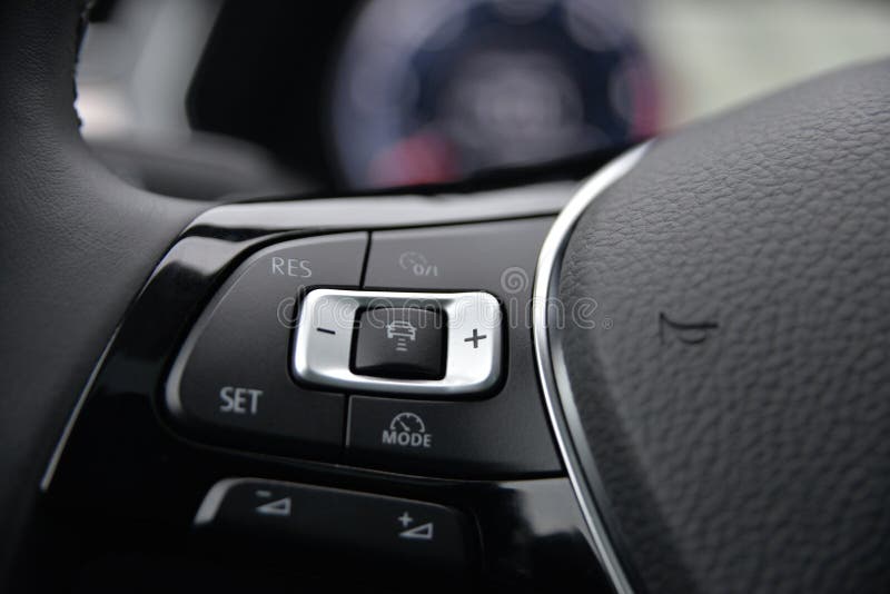 Close Up of a Car S Steering Wheel Controls Featuring Buttons for ...