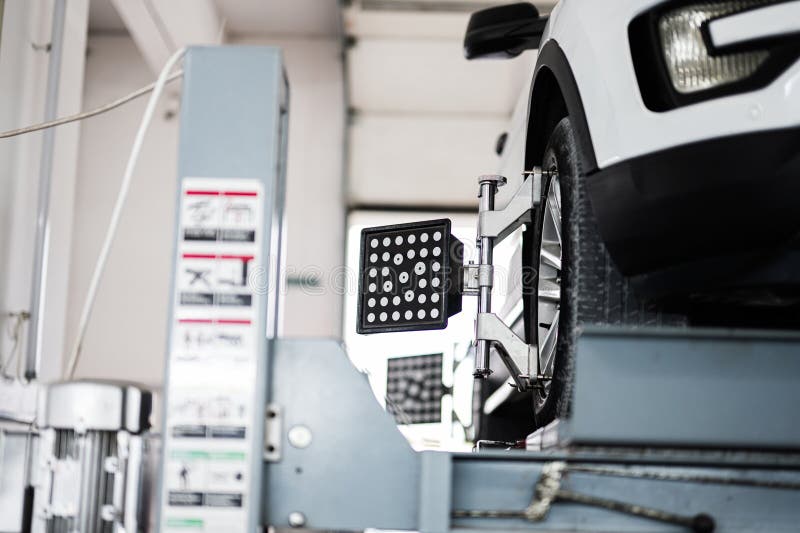 Close-up of Car Wheel Alignment Process in a Modern Garage Stock Image ...