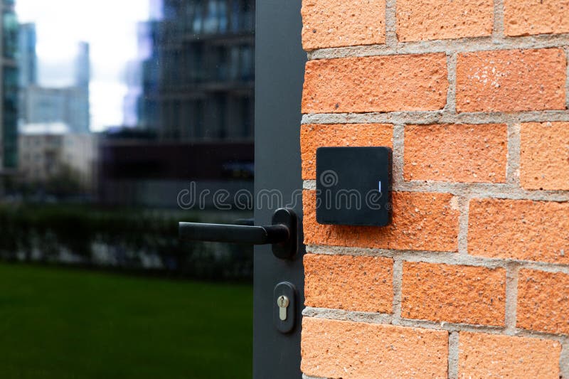 Close Up of Card Reader Mounted on Brick Wall, Emphasizing Modern ...