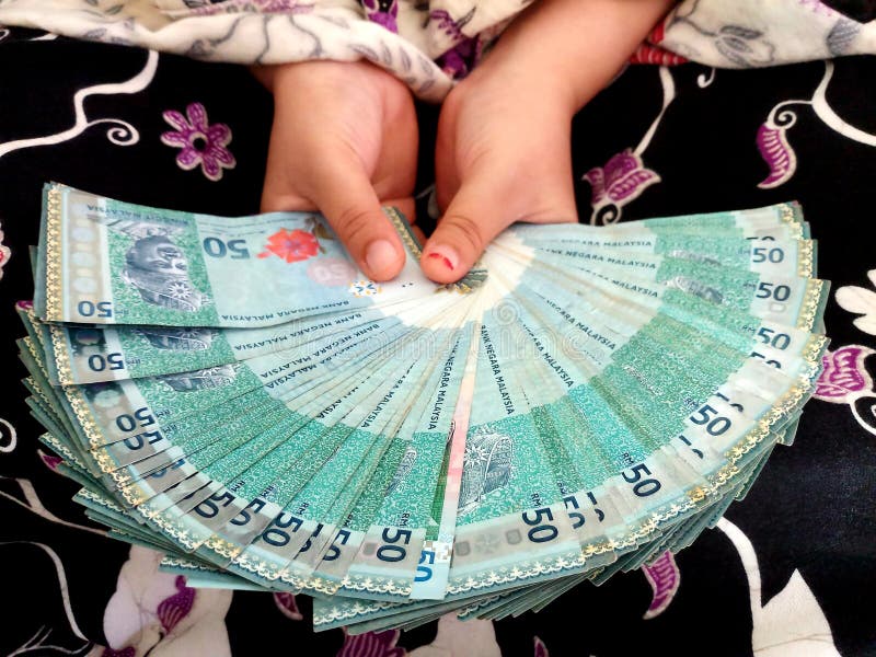 Close Up of Cash Ringgit Malaysia with Female Hand. Editorial Stock ...