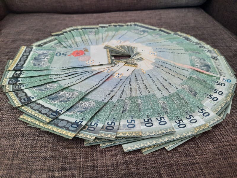 Close Up of Cash Ringgit Malaysia with Female Hand. Stock Photo - Image ...