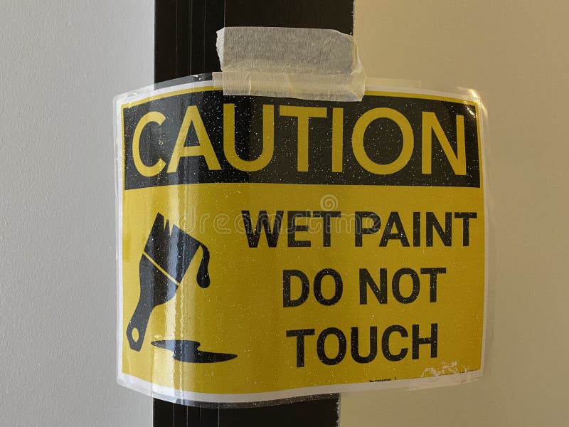 Close Up Caution Wet Paint Sign on the Wall Stock Image - Image of ...