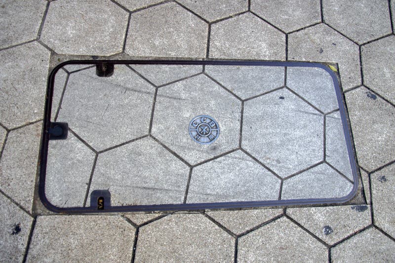 Close Up of a CCB Sewer Hatch at Osaka Japan 4-9-2016 Editorial ...
