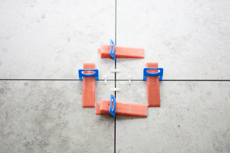 Close-up of Ceramic Tile Installation with Tile Clips and Spacers for ...