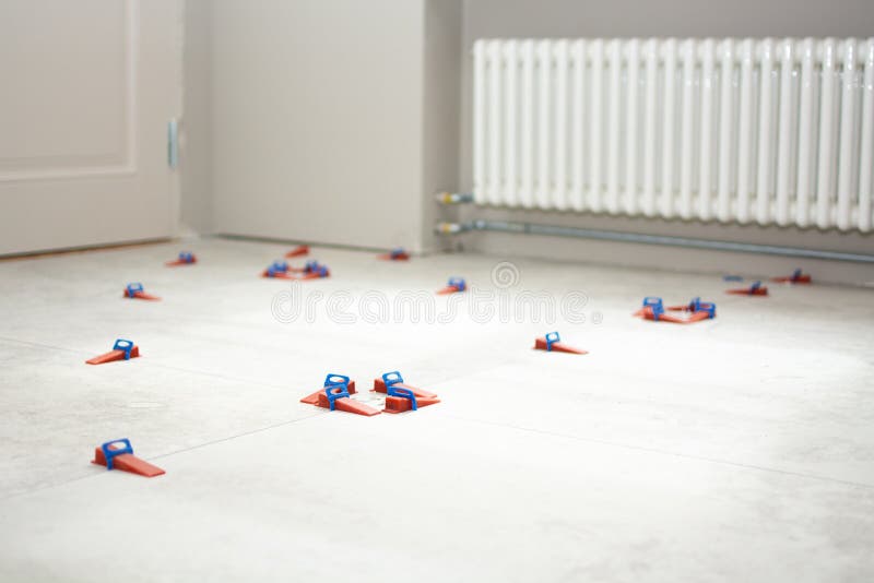 Close-up of Ceramic Tile Installation with Tile Clips and Spacers for ...