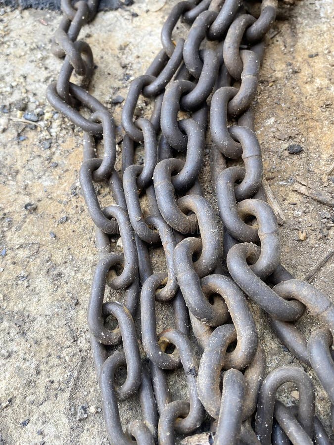 A Chain Laying on the Ground Stock Image - Image of industry, iron ...
