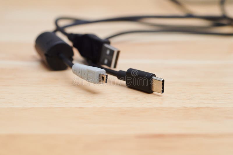 Close Up of Charging Cables Lying on a Table Stock Photo - Image of ...