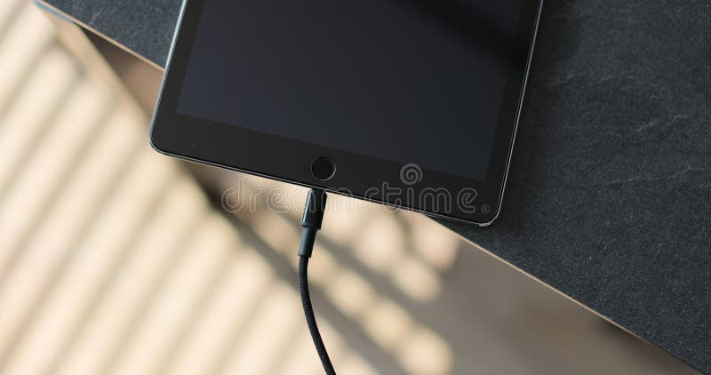 Close-up of the Charging Connection To TabletPC. Tablet Computer ...