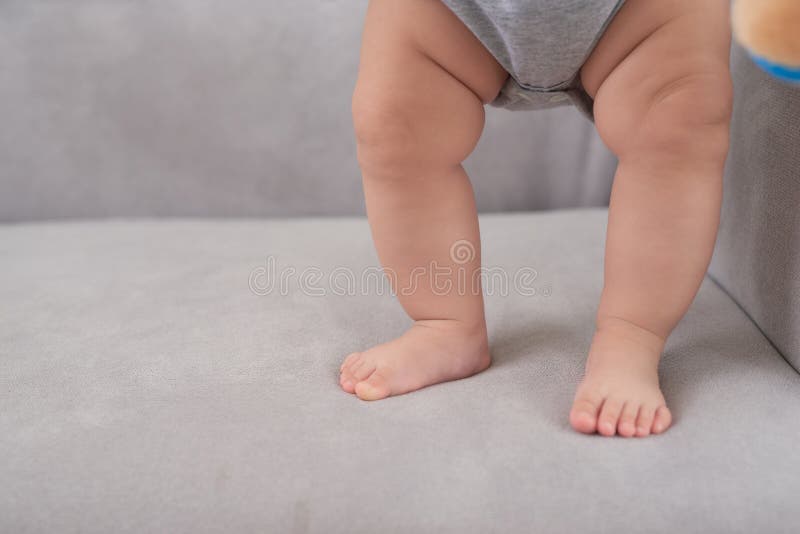 Close Up of the Charming Small Legs Doing the First Steps Stock Photo ...
