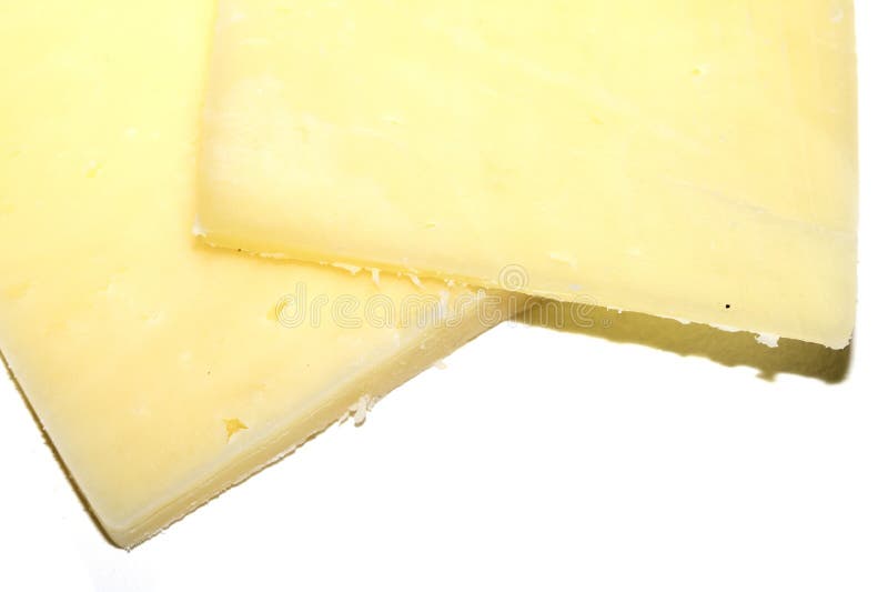 Close Up of Chedder Cheese Slices on a White Background Stock Photo ...
