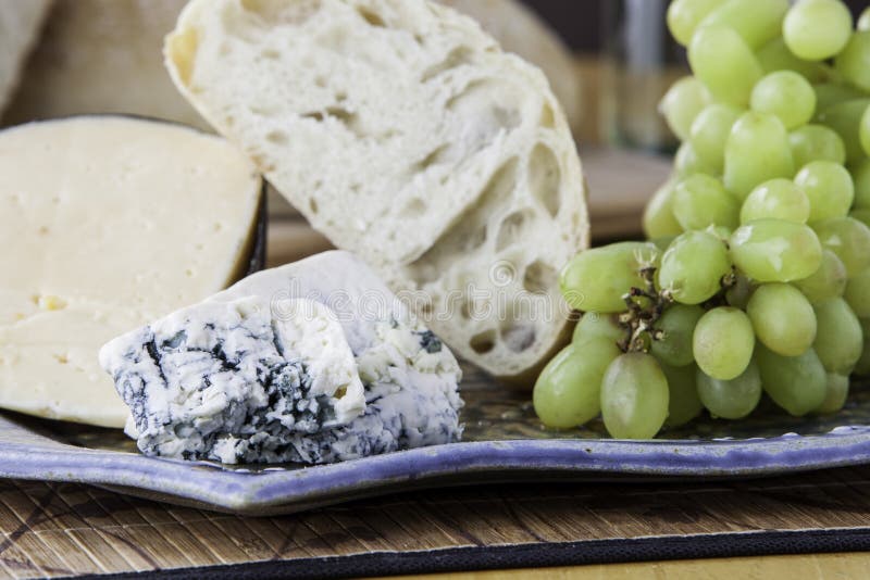 Close Up of Cheese Plate with Bread Stock Photo - Image of grapes ...