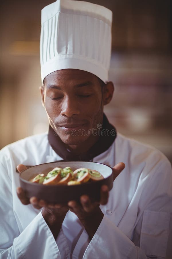 Close-up of Chef with Eyes Closed Smelling Food Stock Photo - Image of ...