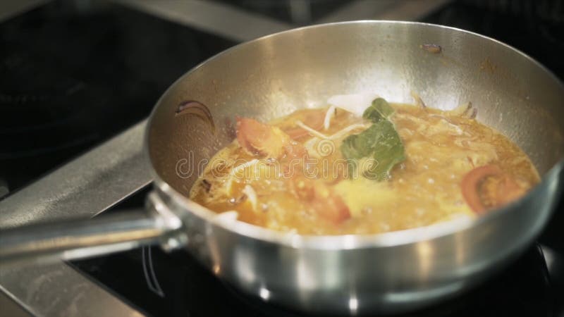 Close-up of Chef`s Hand Boiling Some Dish on a Kitchen at the ...