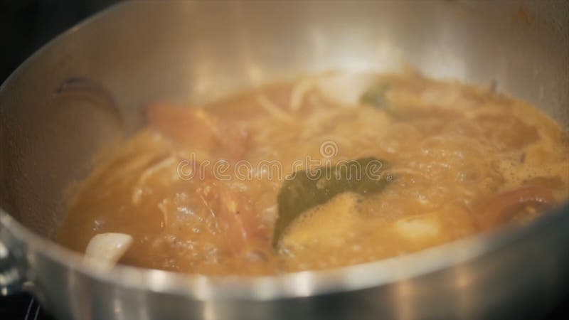 Close-up of Chef`s Hand Boiling Some Dish on a Kitchen at the ...