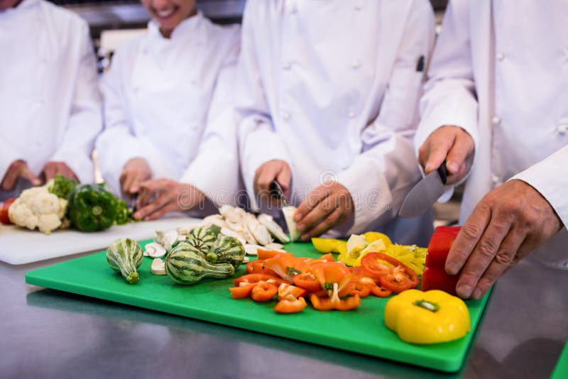 Close-up of Chefs Chopping Vegetables Stock Image - Image of people ...