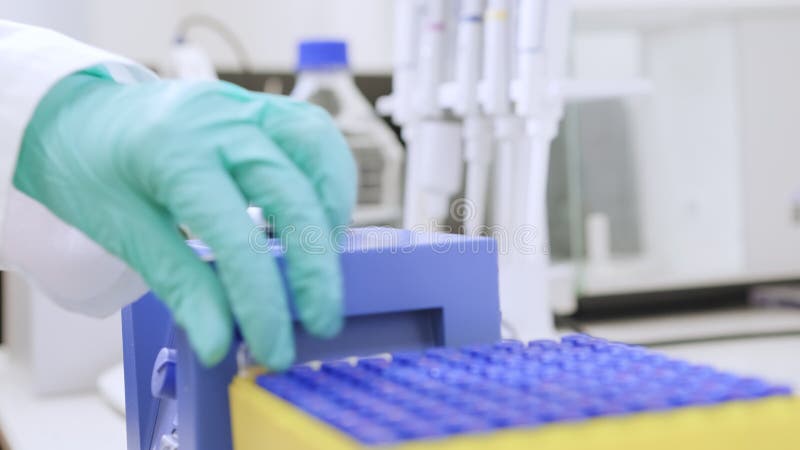 Close Up of a Chemist Shaking Samples Using a Vortex Mixer before HPLC ...