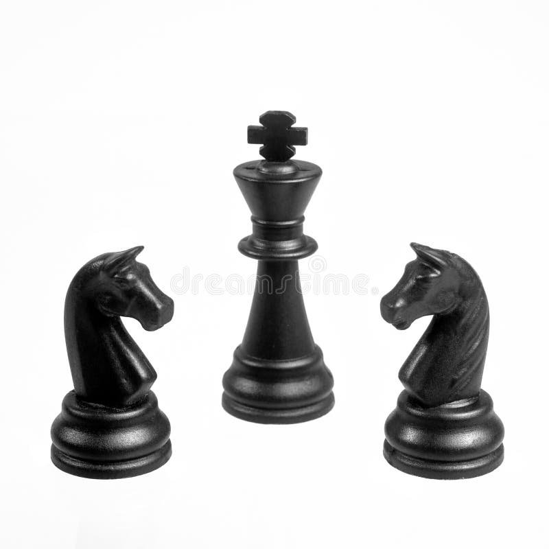 Close Up of Chess King and Knights on White Background. Stock Photo ...