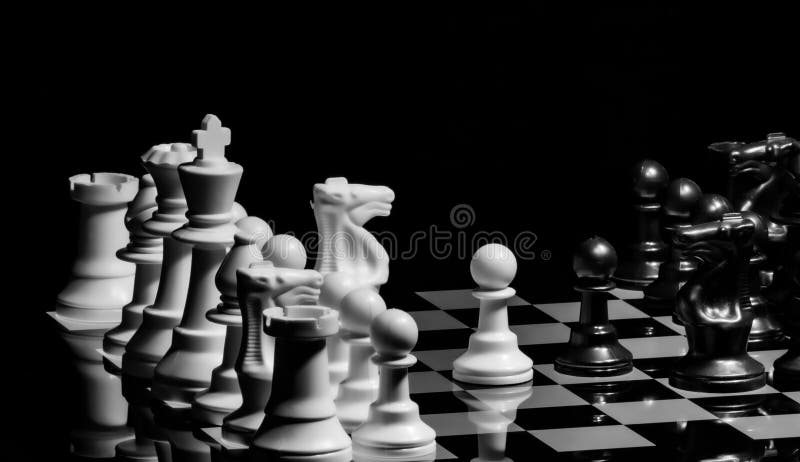 Close Up of Chess Pieces on a Reflective Mirror Board Surface Wi Stock ...