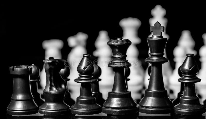 Close Up of Chess Pieces on a Reflective Mirror Board Surface Wi Stock ...