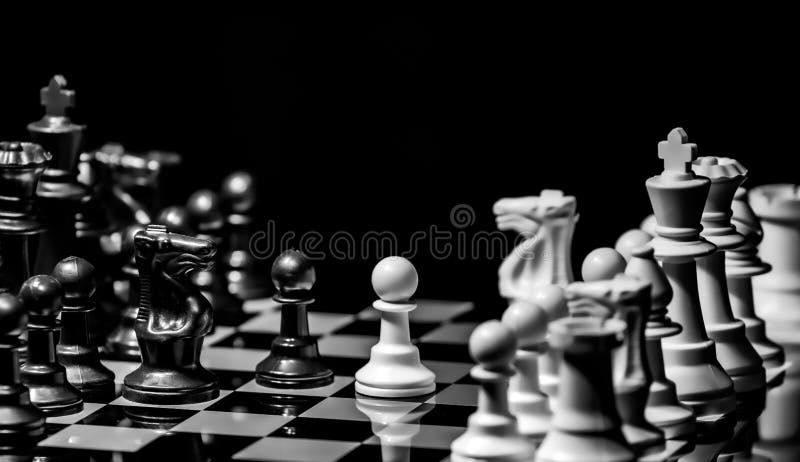 Close Up of Chess Pieces on a Reflective Mirror Board Surface Wi Stock ...