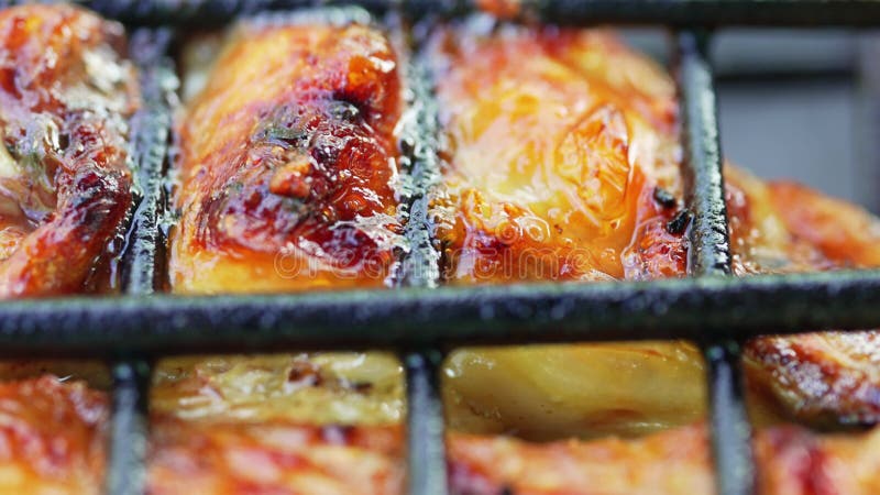 Close-up. Chicken Steaks on a Grill Rack Cooking Over an Open Fire ...