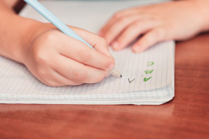 Close Up of Child Writing Letters in Notebook Stock Image - Image of ...