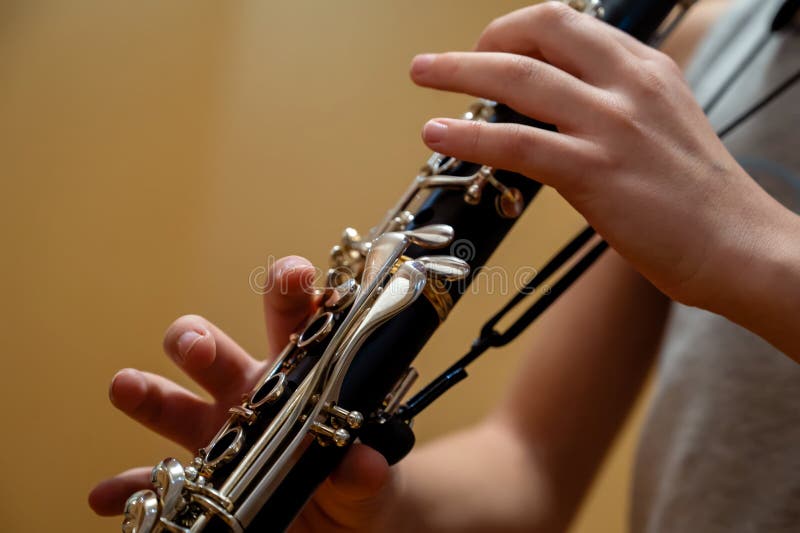 Close Up of Children S Hands Playing the Clarinet Stock Image - Image ...