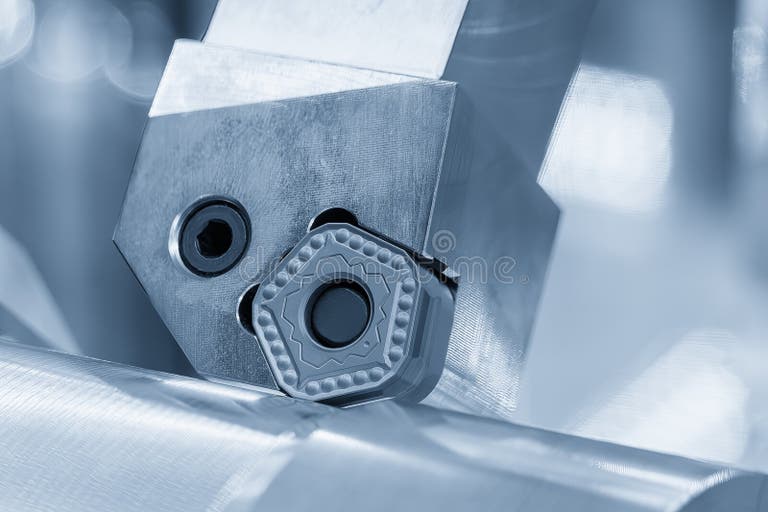 Close Up the Chip Insert on the Lathe Machine in the Light Blue Scene ...