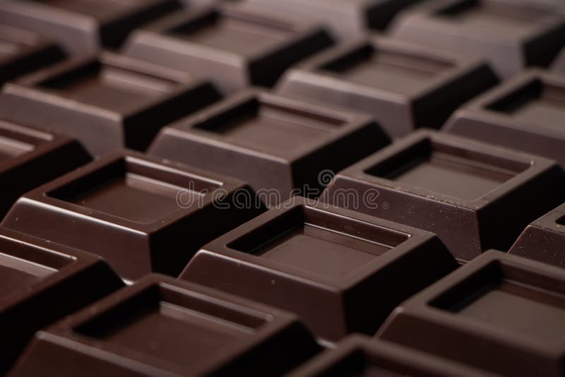 Close Up a Chocolate Bar Background. Chocolate Bar Cubes Macro Stock ...