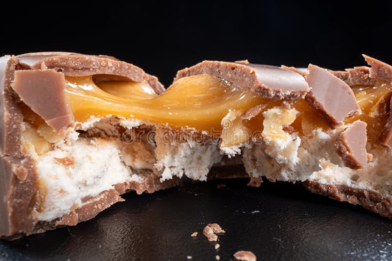 Close Up of Chocolate Candy Bar with Caramel Filling, Snapped in Half ...