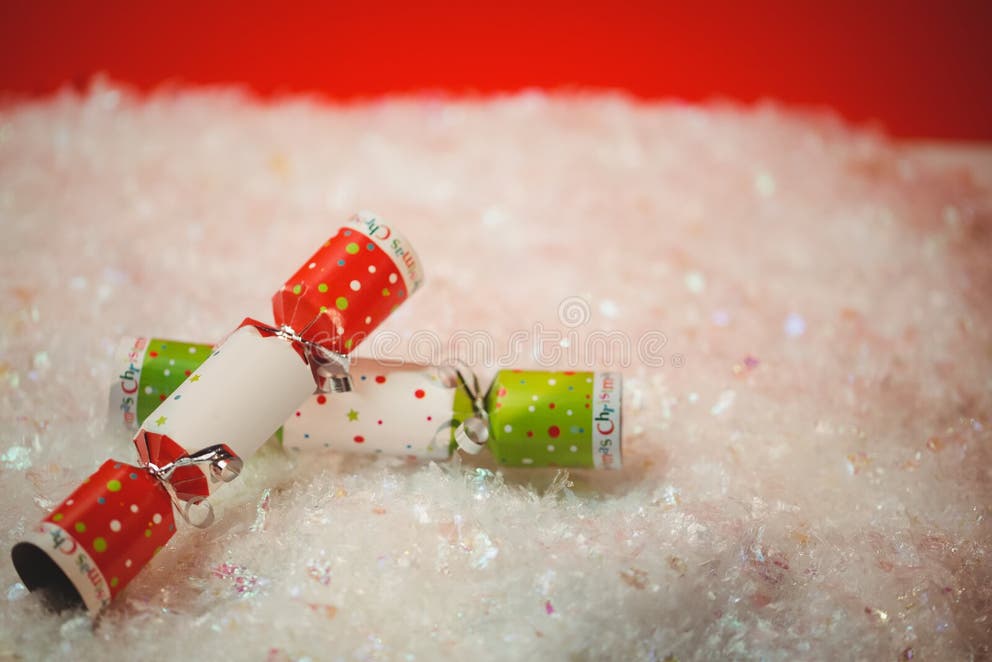 Close-up of Christmas Crackers on Snow Stock Image - Image of homey ...