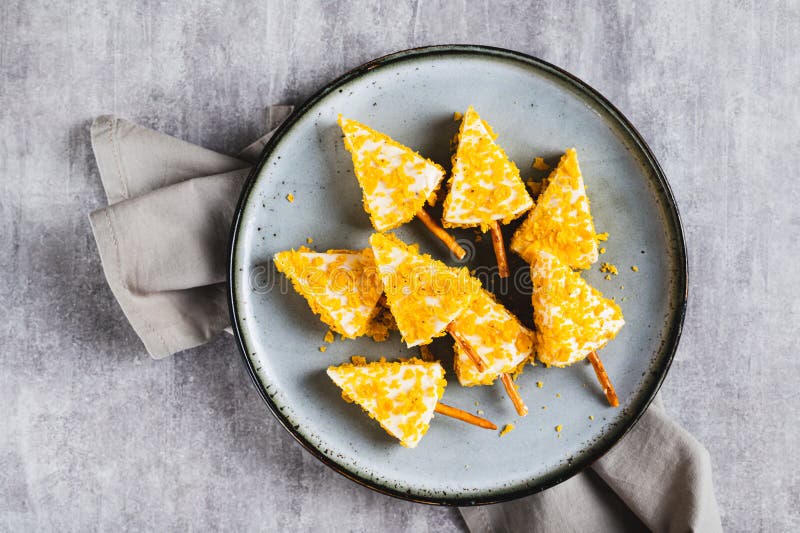 Close Up of Christmas Trees Made from Triangle Cheese in Nacho Crumbles ...