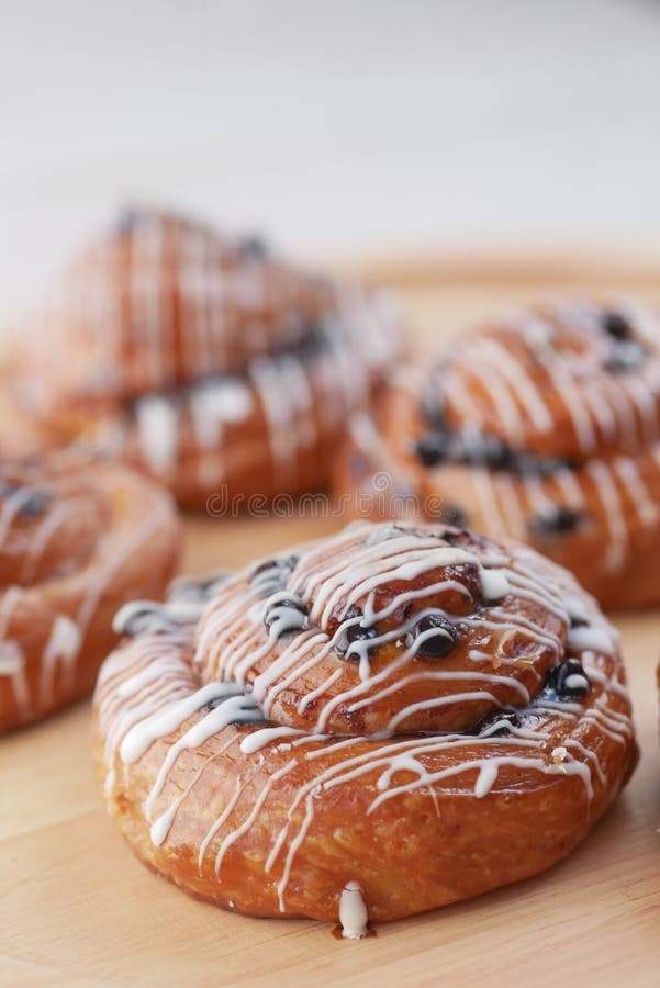 Close Up Cinnamon Danish Roll on Table Stock Image - Image of cinnamon ...
