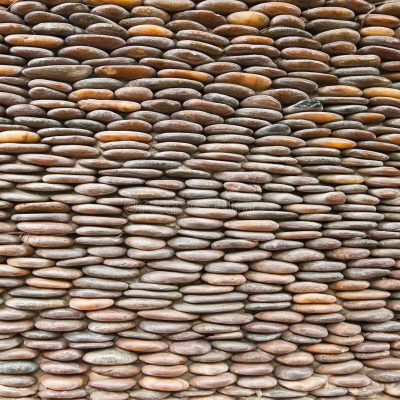 Close Up of Circle Pebble Wall Stock Image - Image of ecology, closeup ...