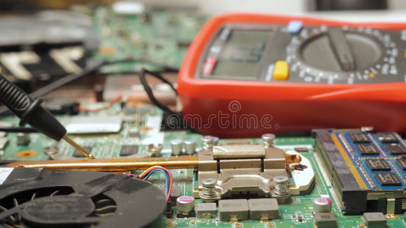 Close-Up of Circuit Board Testing with Multimeter Probes Stock Footage ...