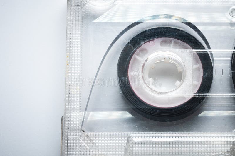 Close-up of a Classic Audio Cassette Tape with Magnetic Tape Inside ...