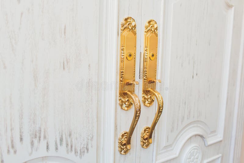 Close Up of Classic Golden Door Handle on White Door. Stock Image ...