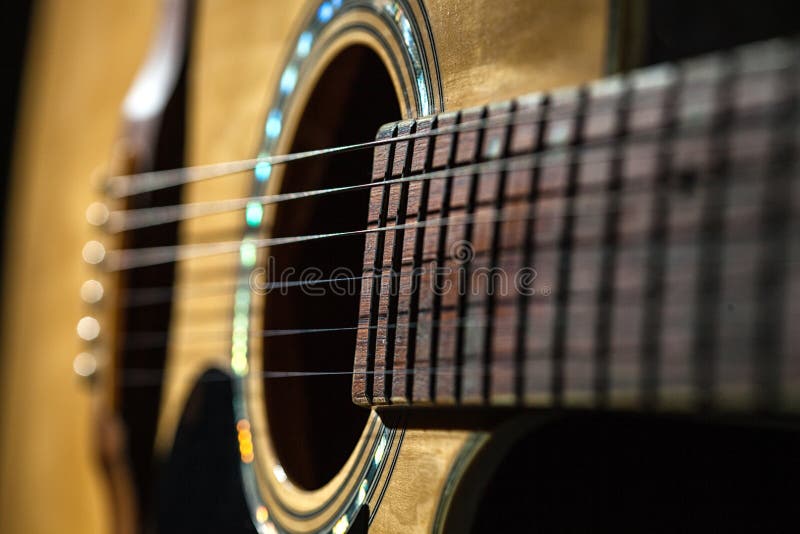 Close-up of a Classical Acoustic Guitar in Beautiful Lighting Stock ...