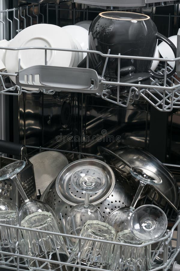 Close-up of Clean Dishes Inside the Dishwasher Stock Image - Image of ...