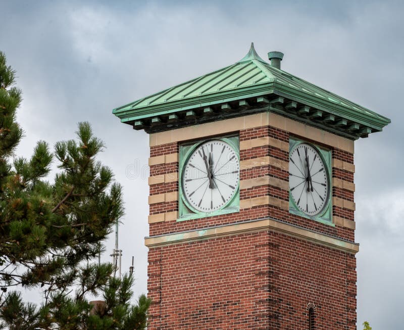 Close Up of a Clock Tower with Green Roof Stock Photo - Image of ...