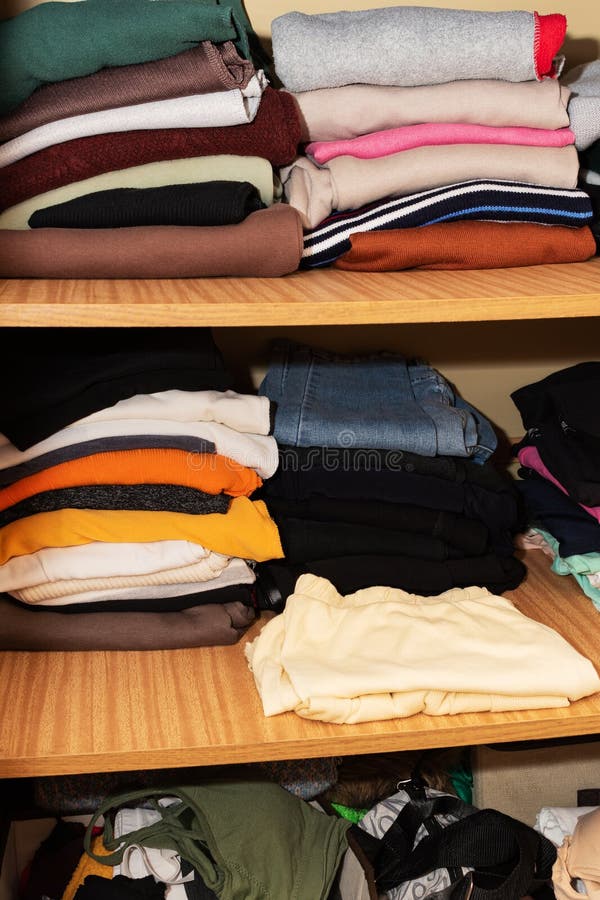 Close-up of the Clothes on the Shelf. Closet with Clothes Stock Photo ...
