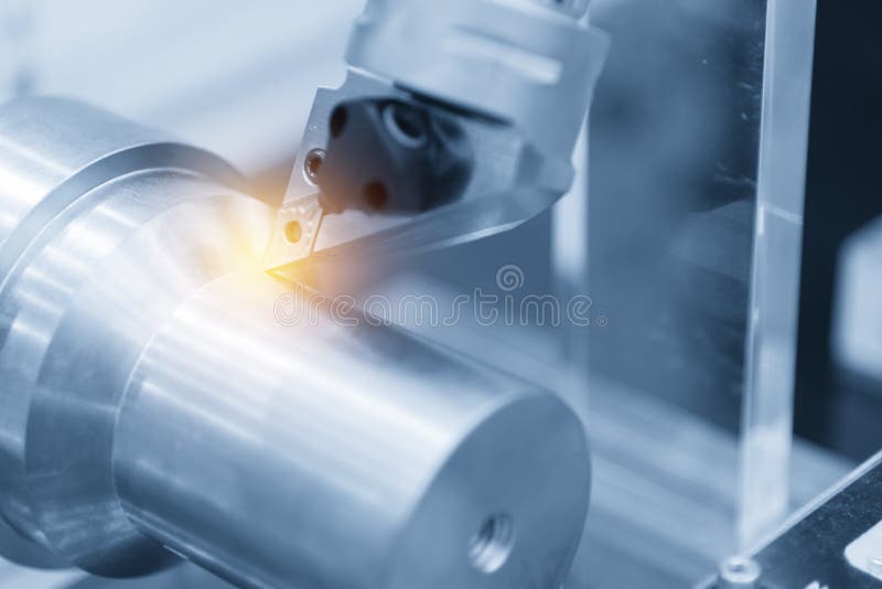 Close Up of the CNC Lathe Turning Machinecutting Metal Shaft Stock ...