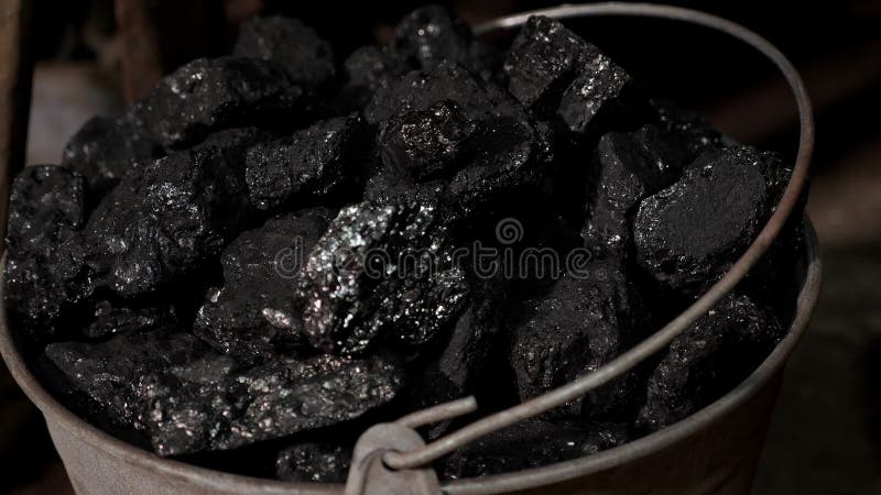 Close-up of Coal in a Bucket in the Forge. Workplace in the Forge Stock ...