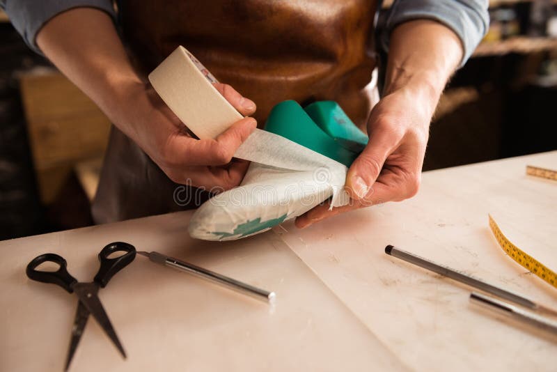 Close Up of a Cobbler Stitching a Part of Shoe Stock Photo - Image of ...