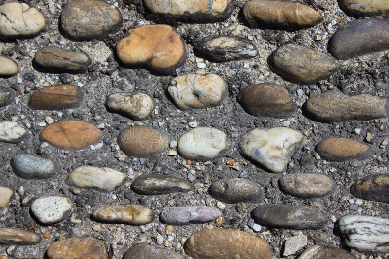 Close-up of Cobblestone Pavement Texture with Natural Stones in Dry ...