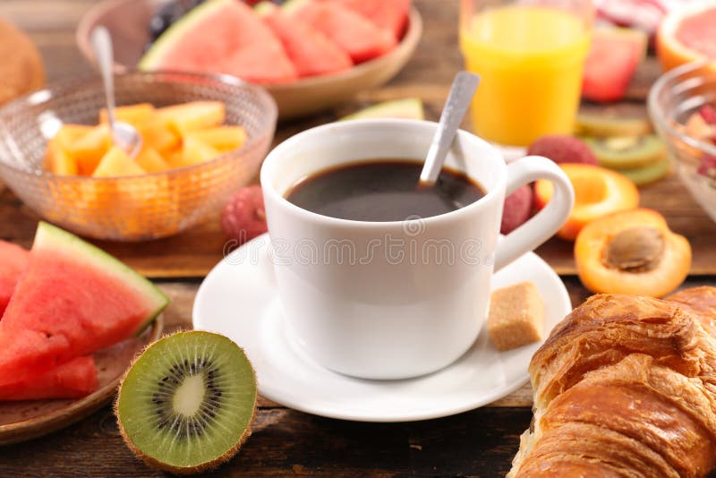 Coffee cup and fruit stock photo. Image of bread, orange - 137589516