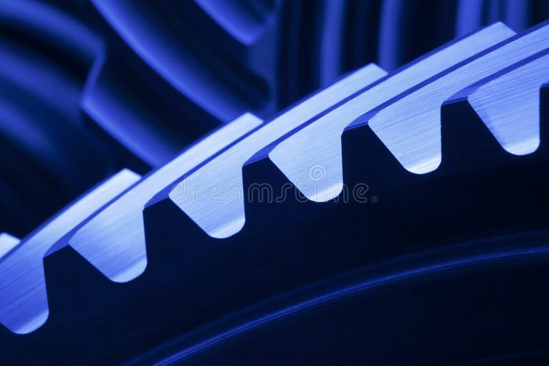 Close-up of Cog Wheels in a Machinery in Dark Blue Stock Photo - Image ...