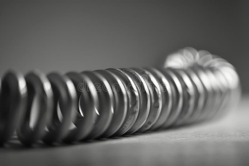 Close-up of a Coiled Pilates Spring with a Hint of Resistance, Ready ...