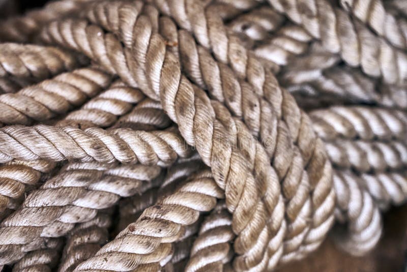Close Up of a Coiled Thick White Rope Creating Intricate Patterns and ...
