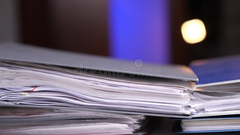 Close-up of Colored Folders with Documents are Stacked on the Table ...